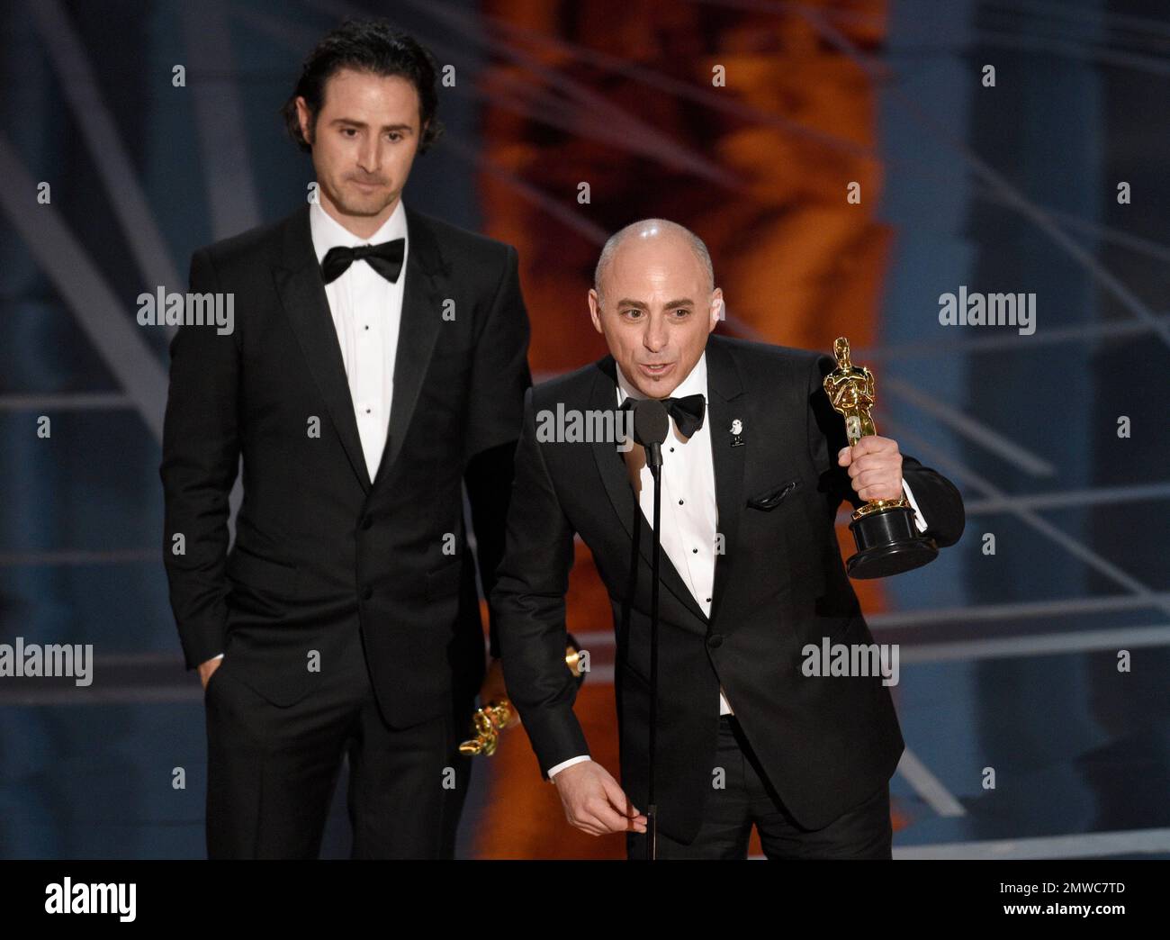 Alan Barillaro, left, and Marc Sondheimer accept the award for best ...