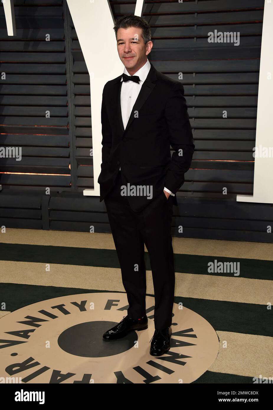 Uber CEO Travis Kalanick arrives at the Vanity Fair Oscar Party on ...