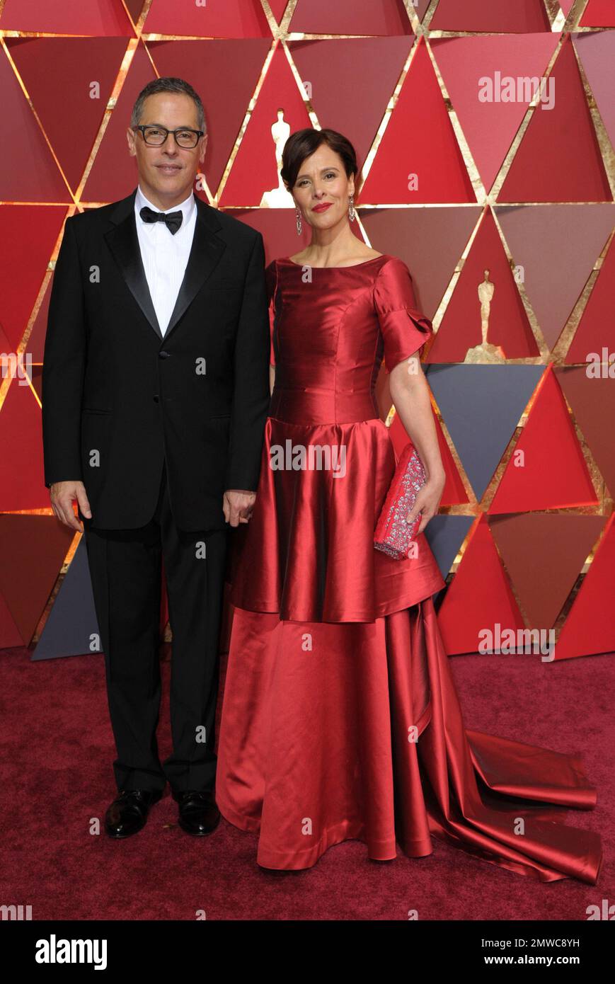 Rodrigo Prieto, left, and Monica Prieto arrive at the Oscars on Sunday ...