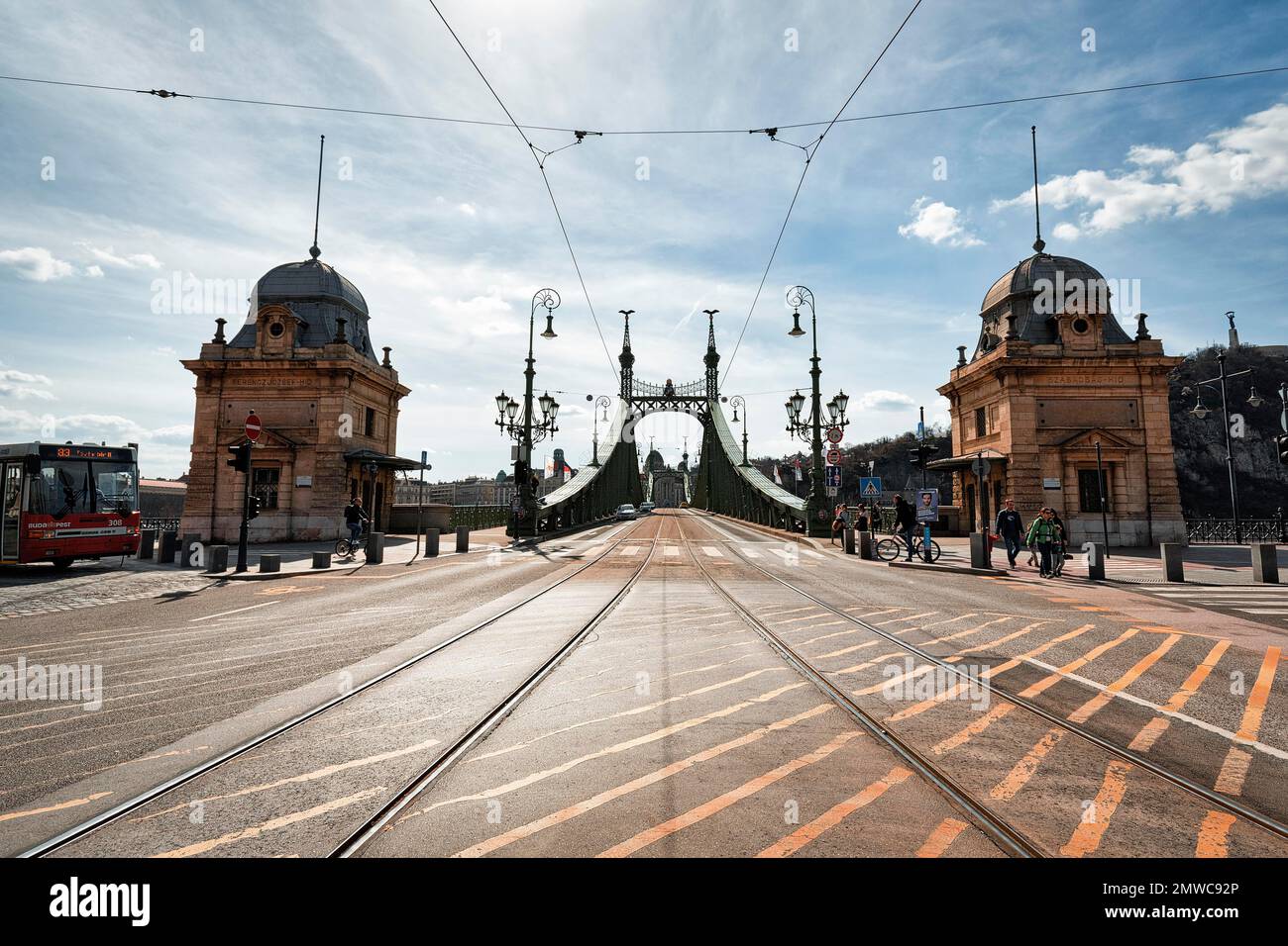 Liberty Bridge, tram tracks and bridge gate, backlight, Pest, Budapest ...