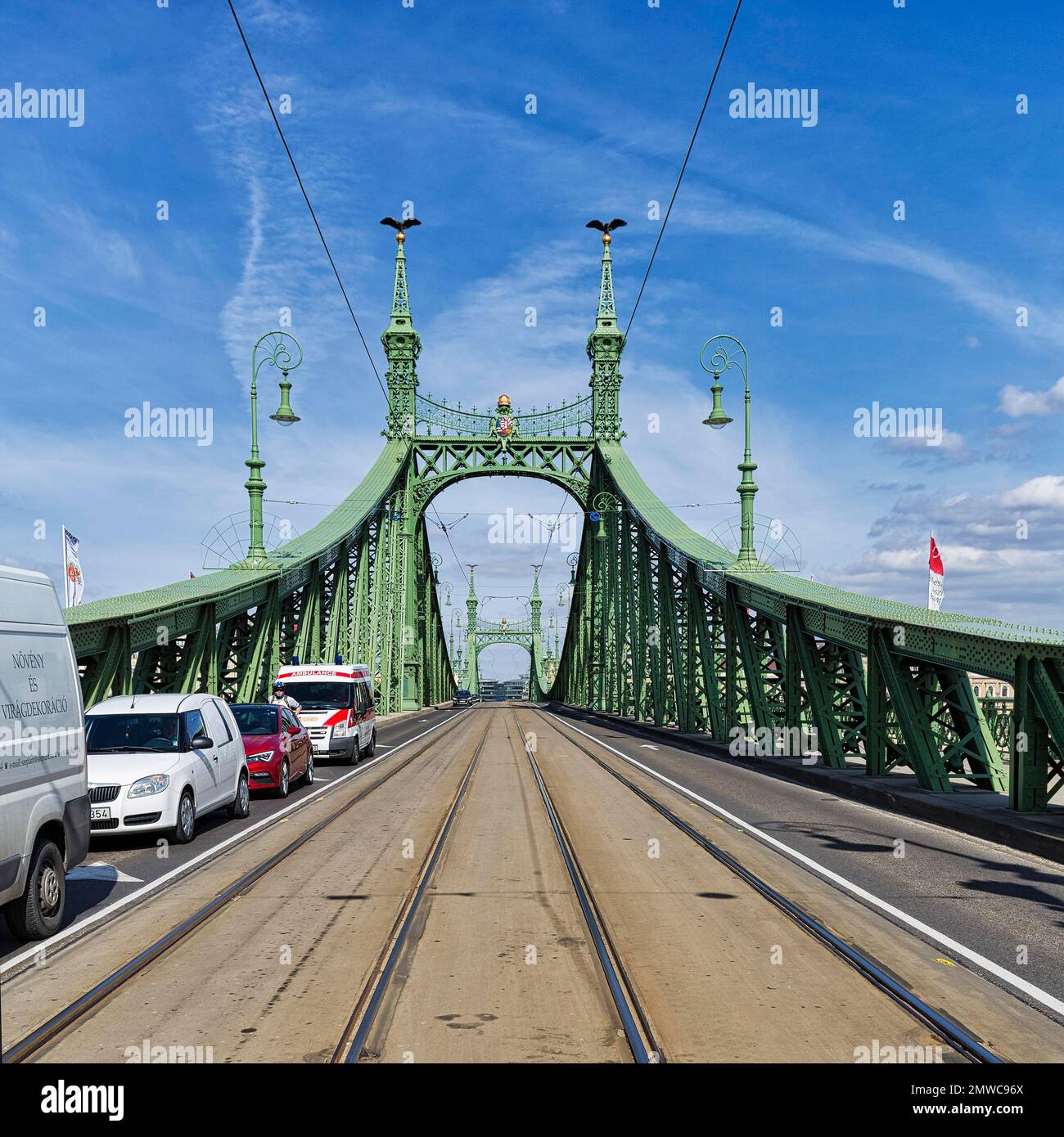 Road traffic, tram tracks and bridge gate on the Freedom Bridge, Buda ...