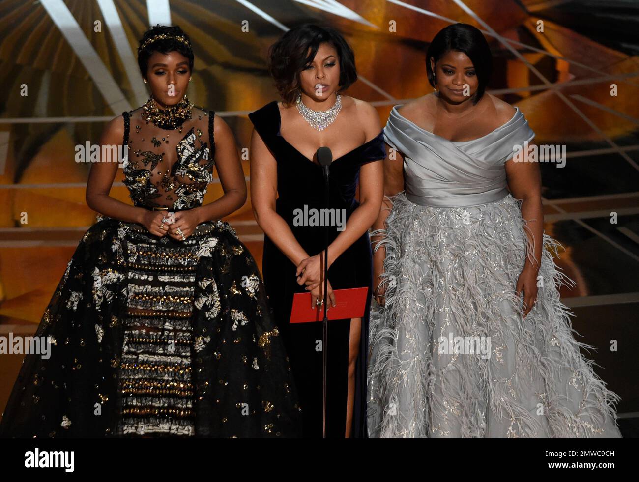 Janelle Monae, from left, Taraji P. Henson, and Octavia Spencer present ...