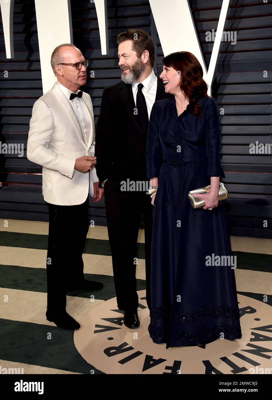 Michael Keaton, from left, Nick Offerman and Megan Mullally arrive at ...