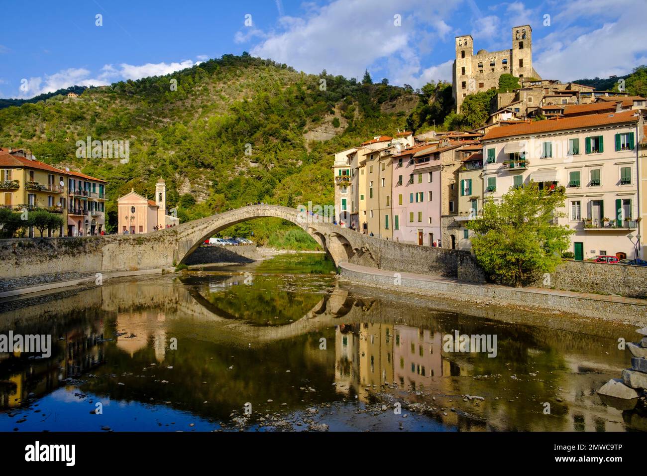 Old arch bridge, Ponte Vecchio over the Nervia river with Castello di ...