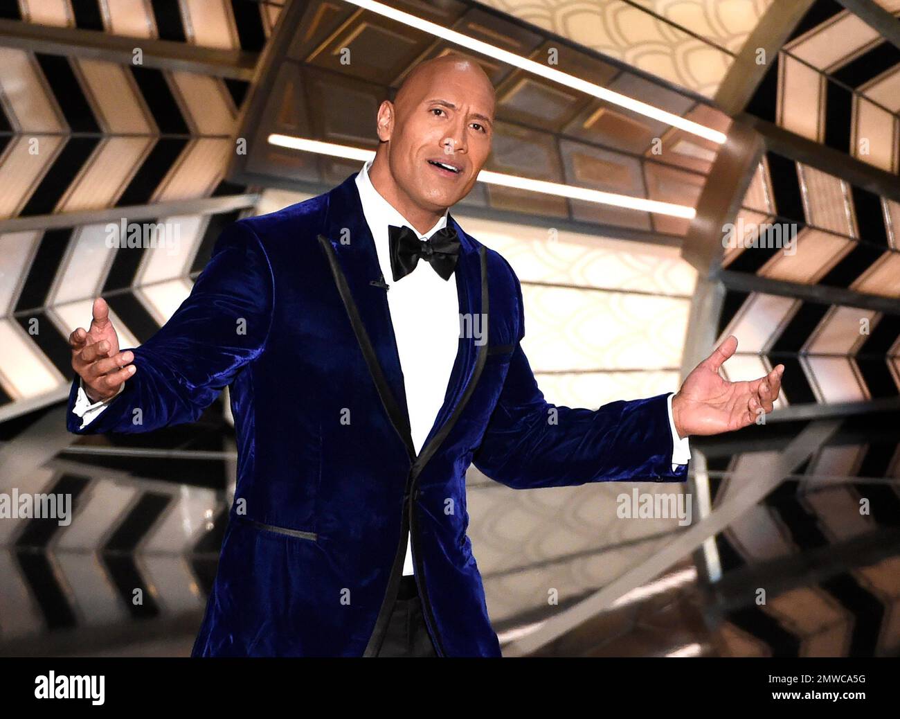 Dwayne Johnson introduces a performance from best original song nominee "How Far I'll Go" from ...