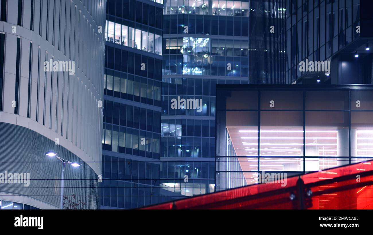 Skyscraper lobby in business district. Big glass windows in commercial ...