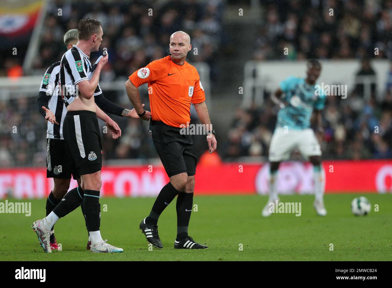 The match referee Paul Tierney in discussion with Newcastle United's ...
