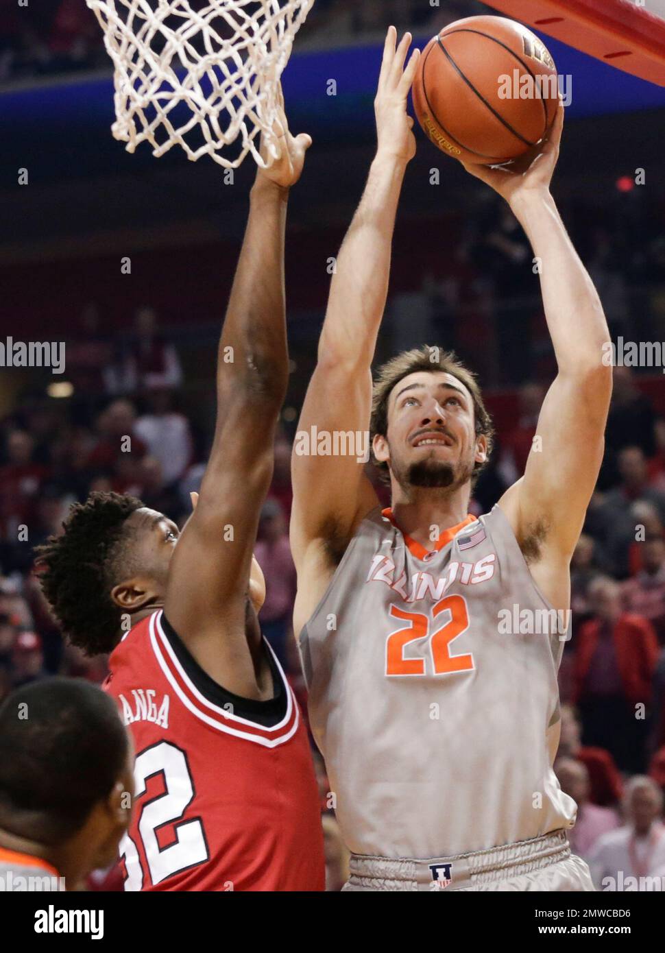 Illinois' Maverick Morgan (22) shoots over Nebraska's Jordy Tshimanga ...
