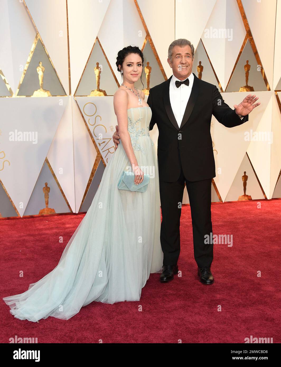 Rosalind Ross, left, and Mel Gibson arrive at the Oscars on Sunday, Feb ...