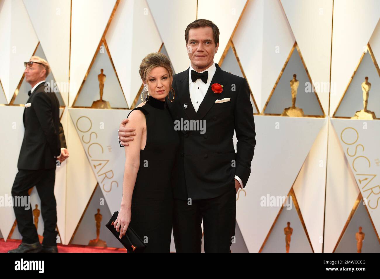 Kate Arrington, left, and Michael Shannon arrive at the Oscars on ...