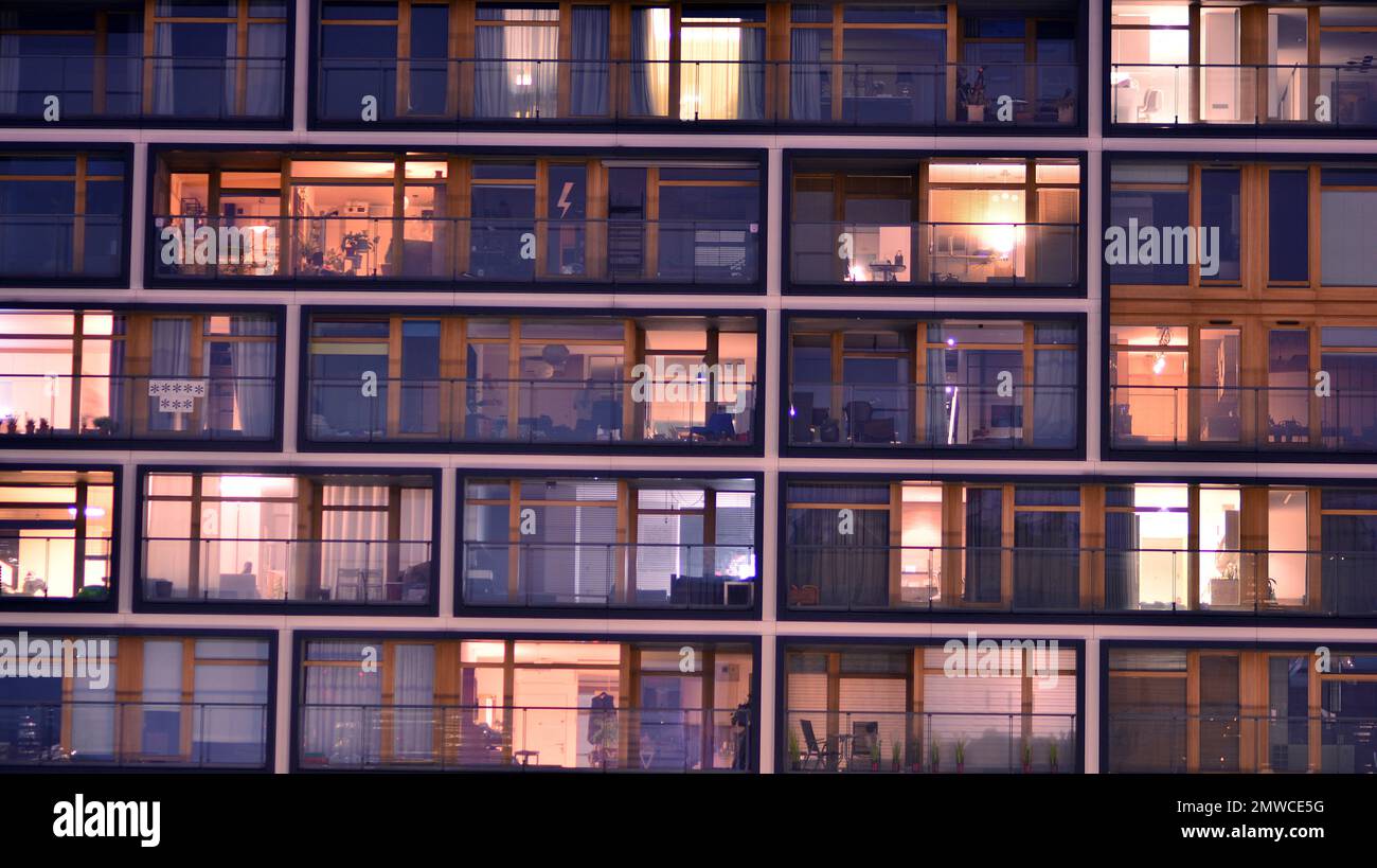 Corporate building at night - business concept. Glass wall office ...