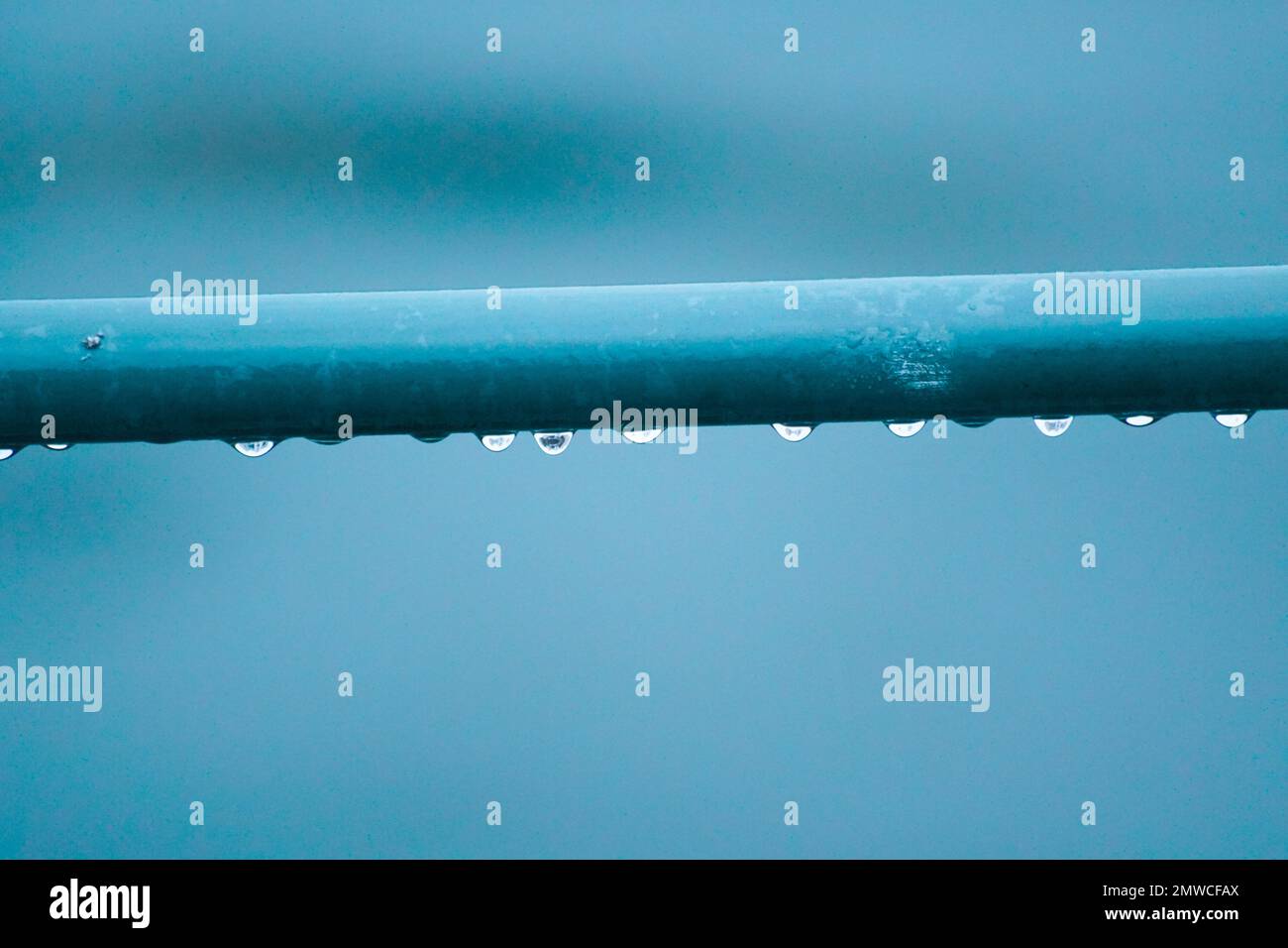 Water drop on metal pipe hi-res stock photography and images - Alamy