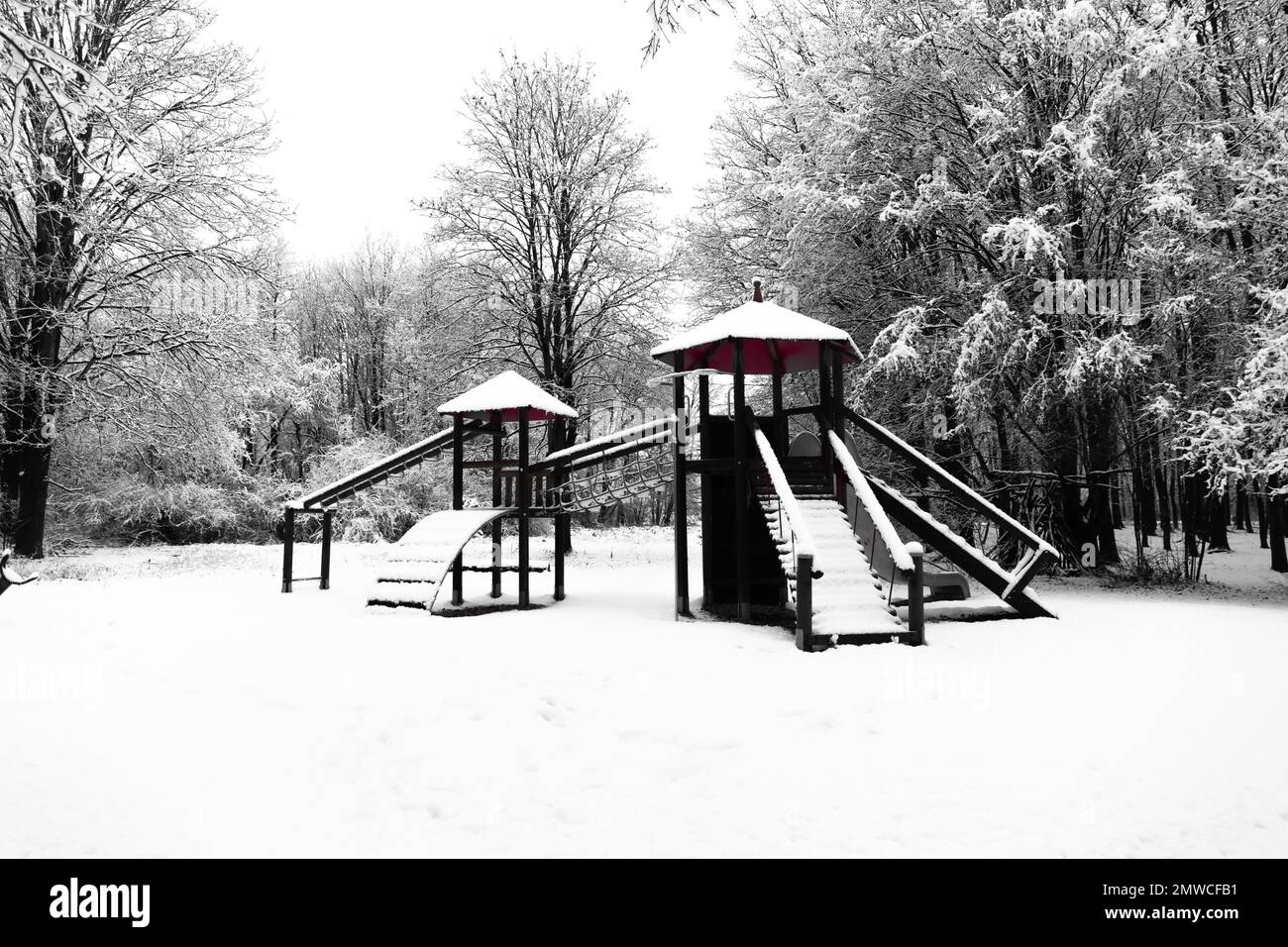 Snowy playground in a park, wintry Stock Photo - Alamy