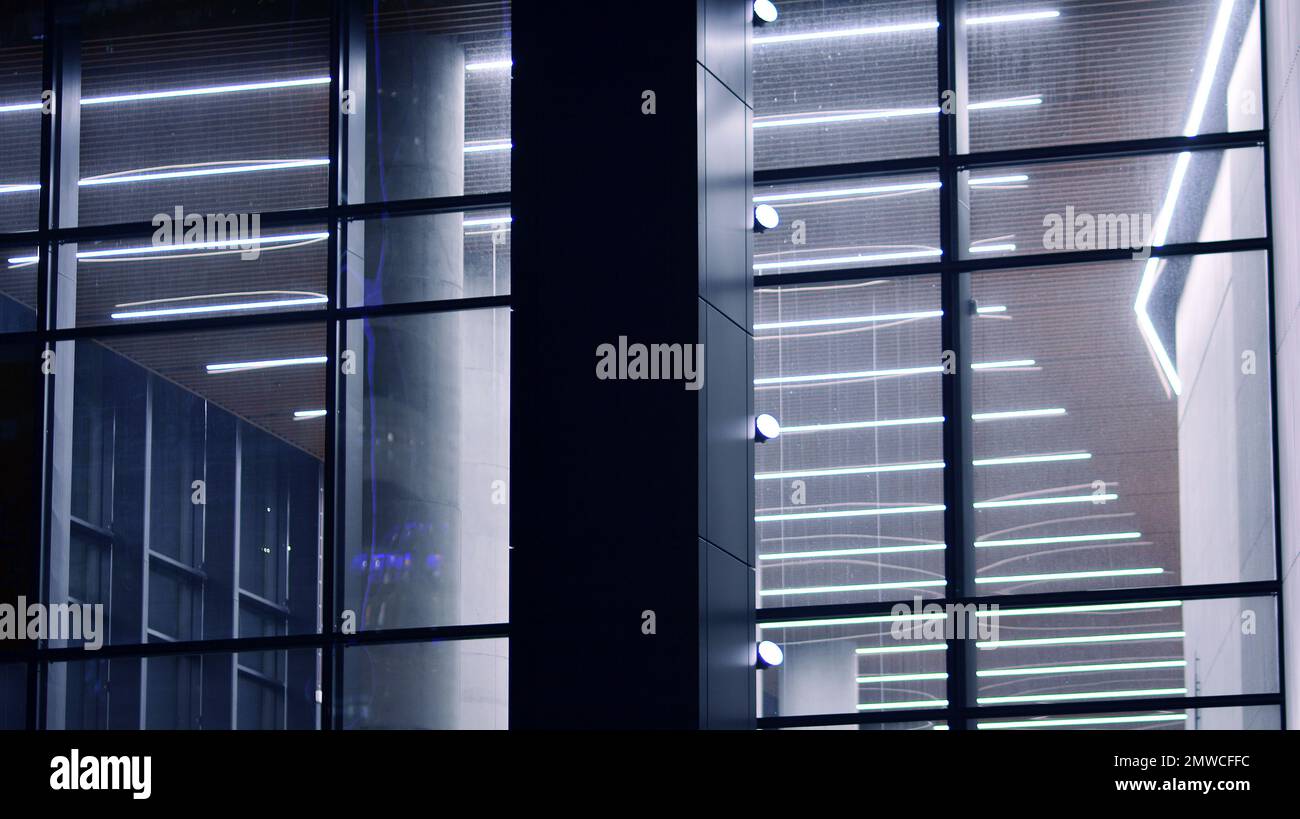 Skyscraper lobby in business district. Big glass windows in commercial ...