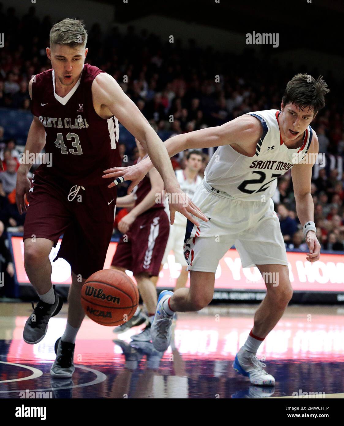 Saint Mary's Dane Pineau, right, and Santa Clara's Nate Kratch (43 ...
