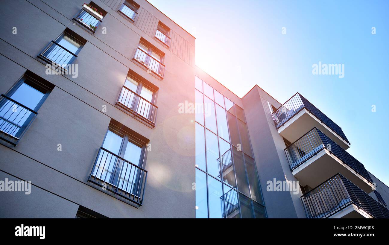 New apartment building with glass balconies. Modern architecture houses ...
