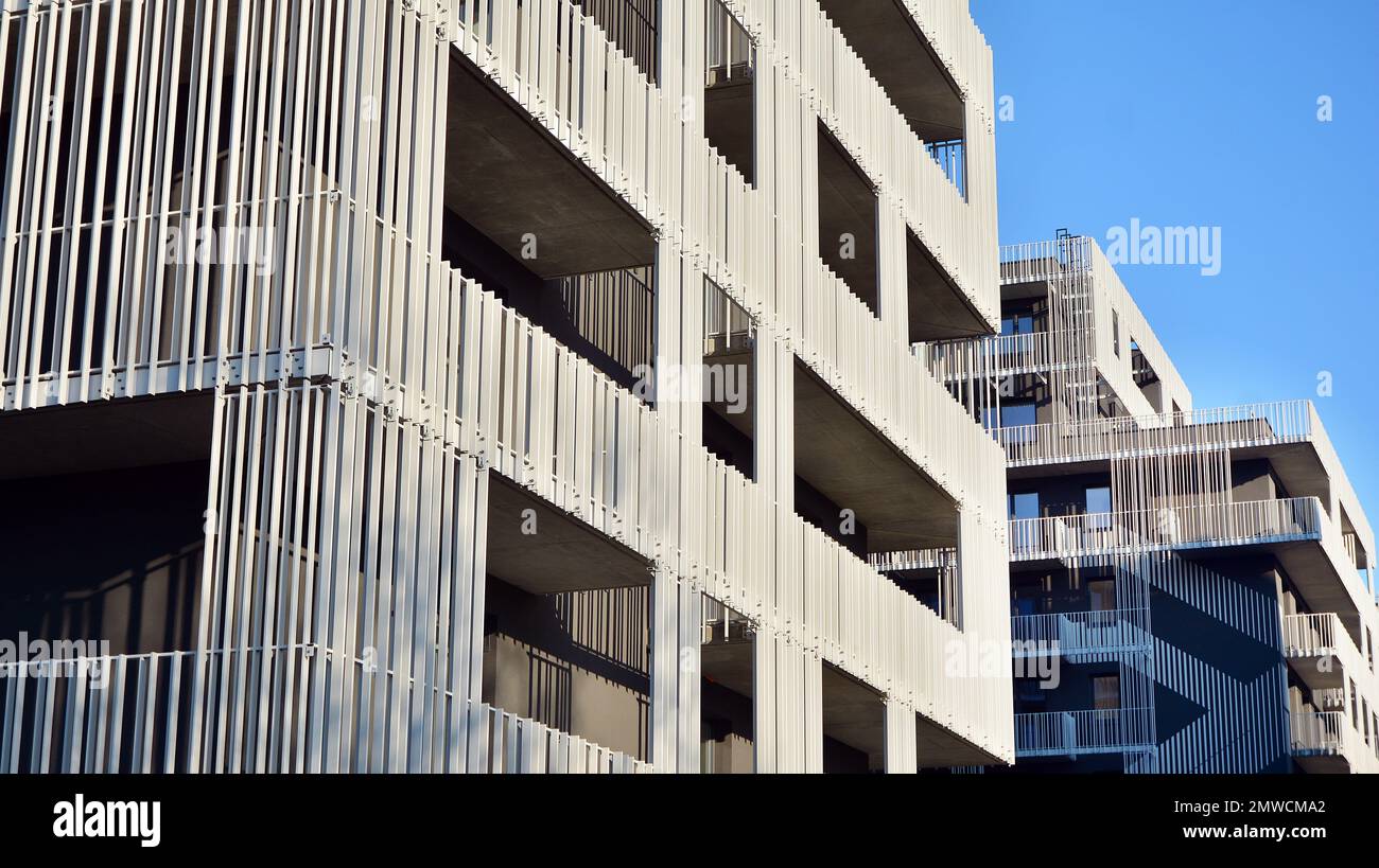 New apartment building with glass balconies. Modern architecture houses ...