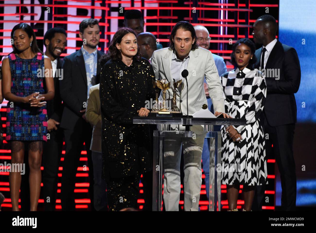 Adele Romanski, center left, and Jeremy Kleiner, center right, and the cast and crew of ...