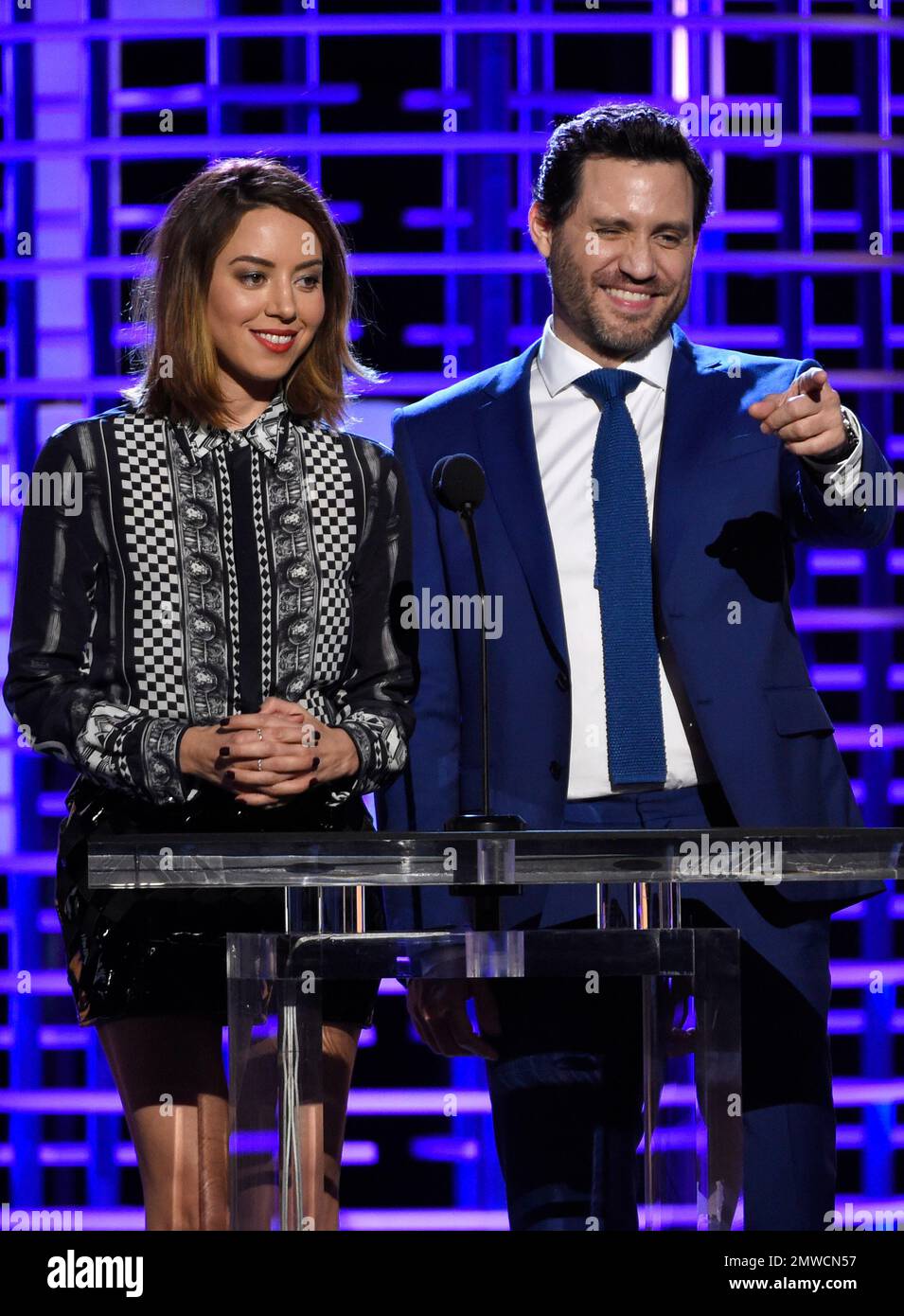Aubrey Plaza, left, and Edgar Ramirez present the John Cassavetes award ...