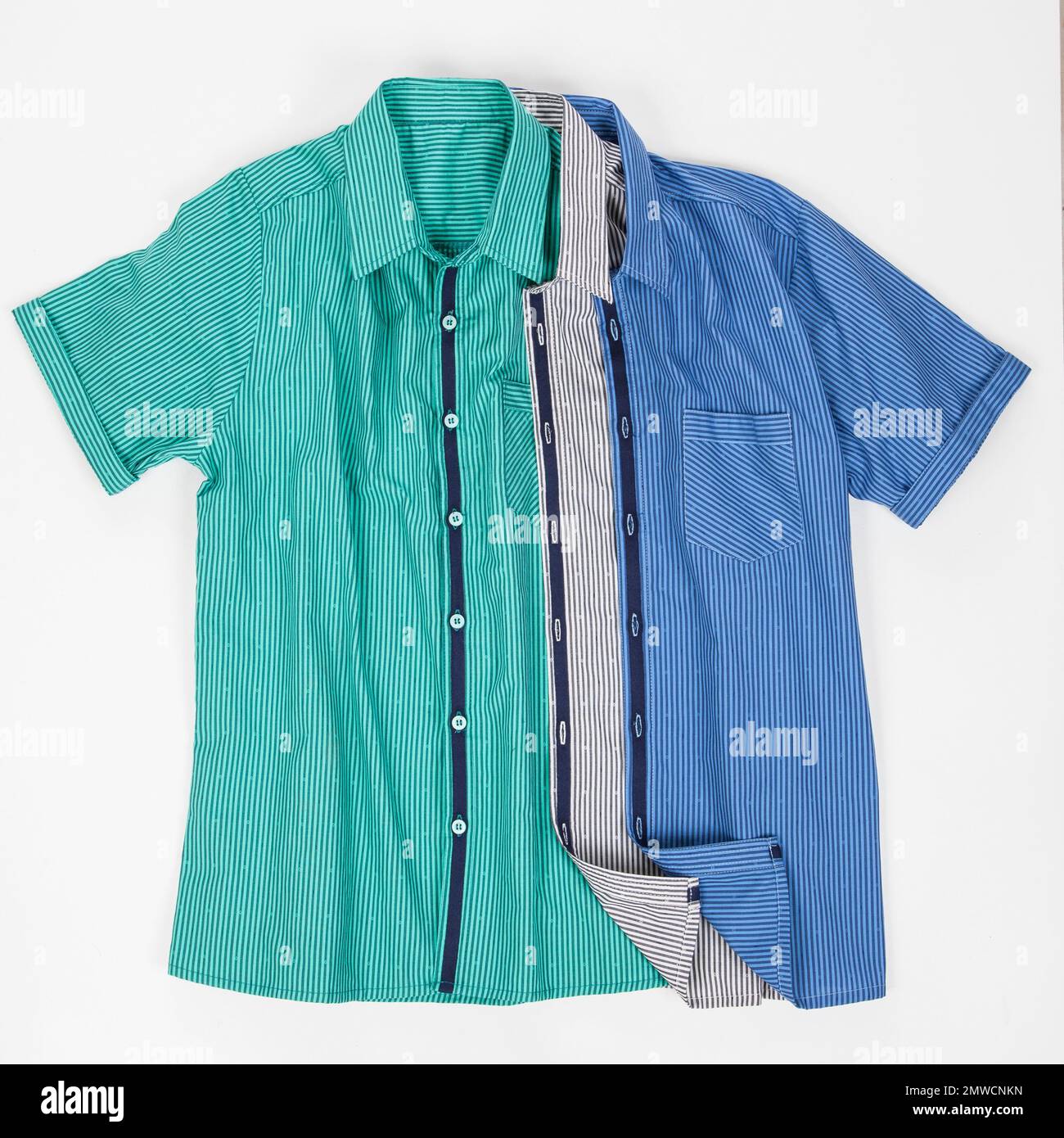 Set Of Three Men Shirts In White Background Stock Photo - Alamy