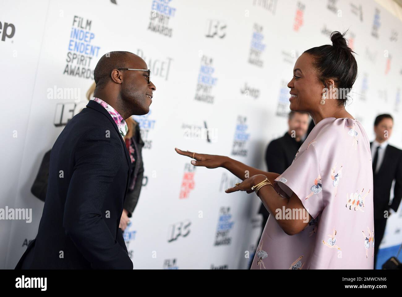Barry Jenkins, left, and Aisha Tyler arrive at the Film Independent ...