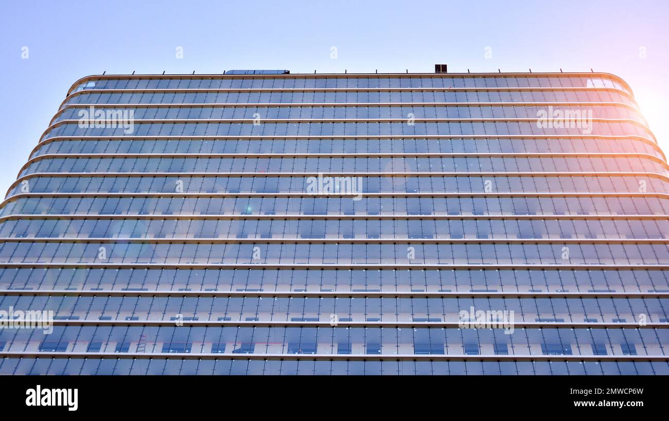 New apartment building with glass balconies. Modern architecture houses ...
