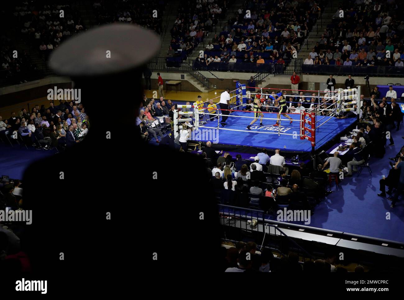 In this Feb. 24, 2017 photo, a Midshipman watches as Mikayla Lint of ...