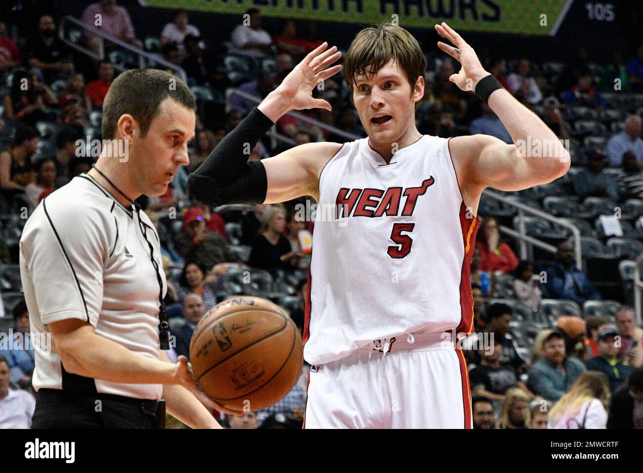 Miami Heat forward Luke Babbitt (5) argues a foul call with an NBA ...