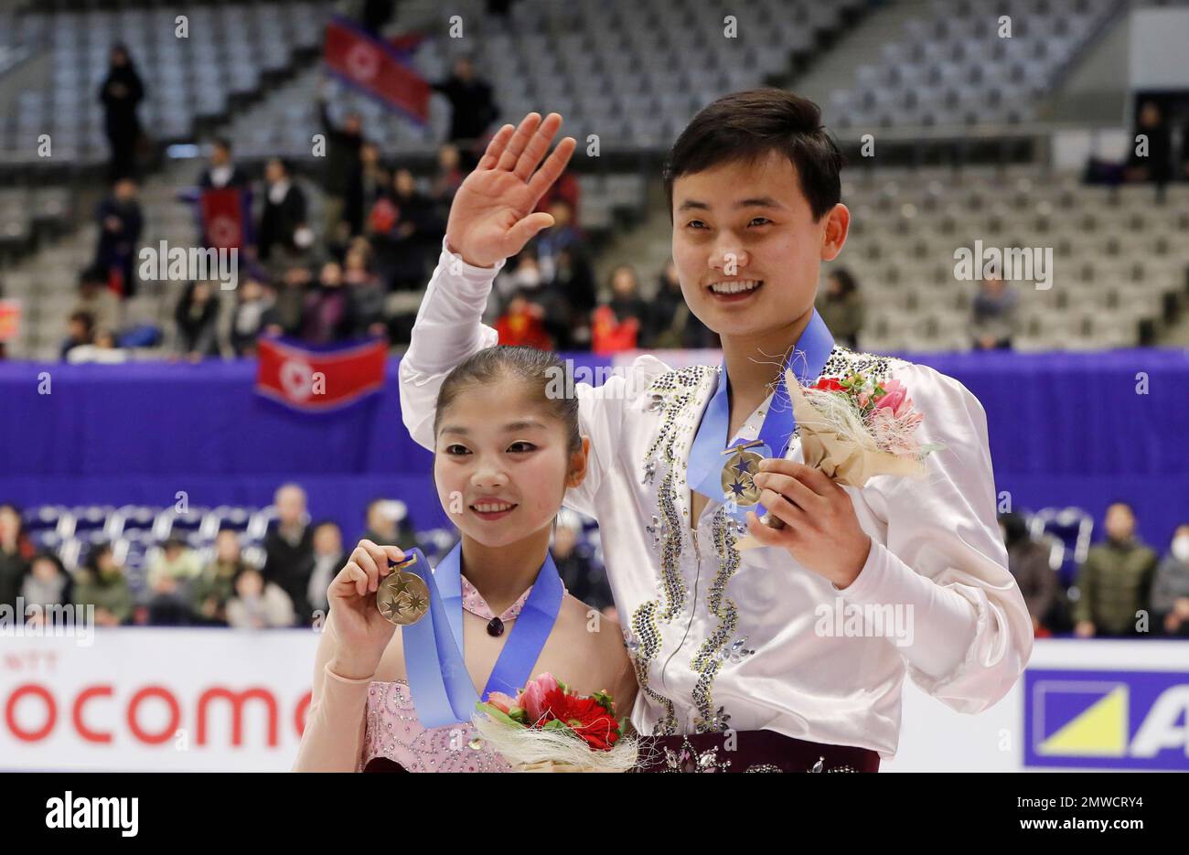 Bronze medalists Ryom Tae Ok and Kim Ju Sik of North Korea pose for ...