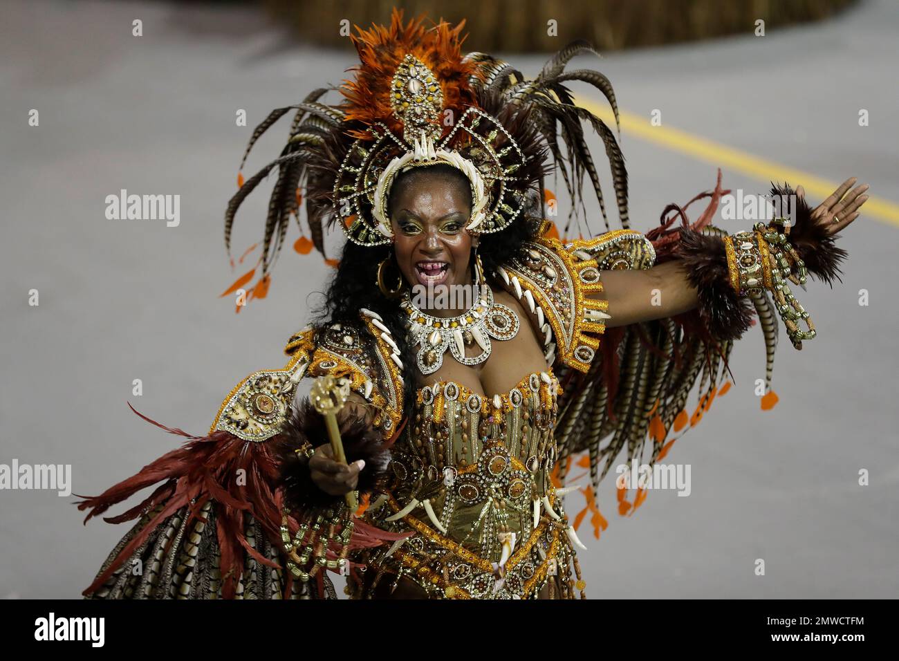 A dancer from the Academicos do Tatuape samba school performs during a ...