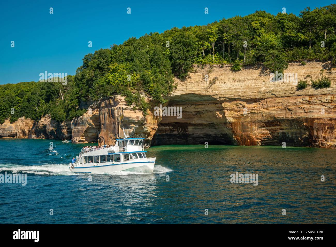 Visiting passengers on tour of pictured rock lake shore Lake Superior ...