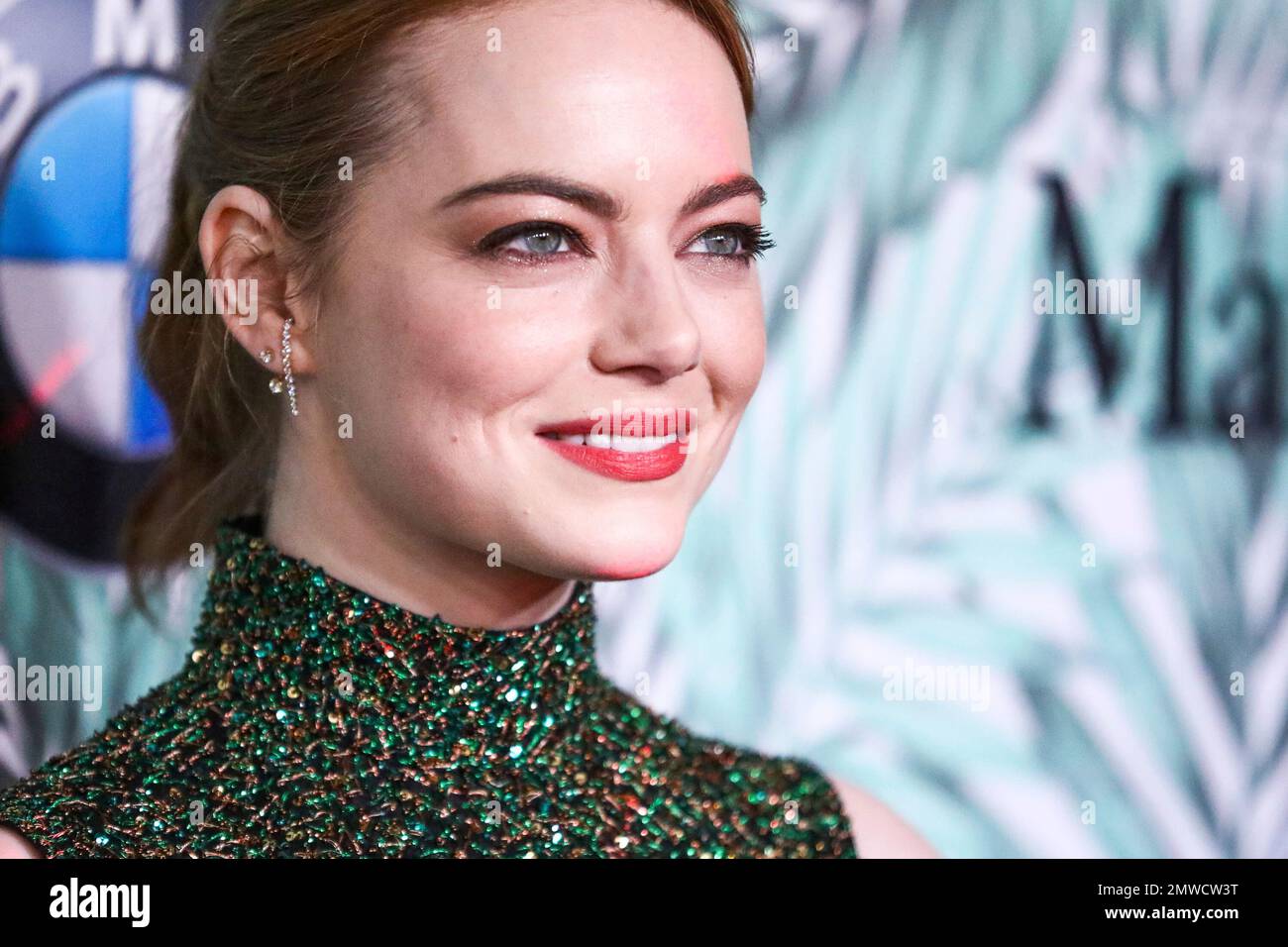 Emma Stone arrives at the 10th Annual Women in Film Pre-Oscar Cocktail ...