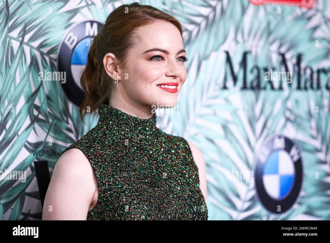 Emma Stone arrives at the 10th Annual Women in Film Pre-Oscar Cocktail ...