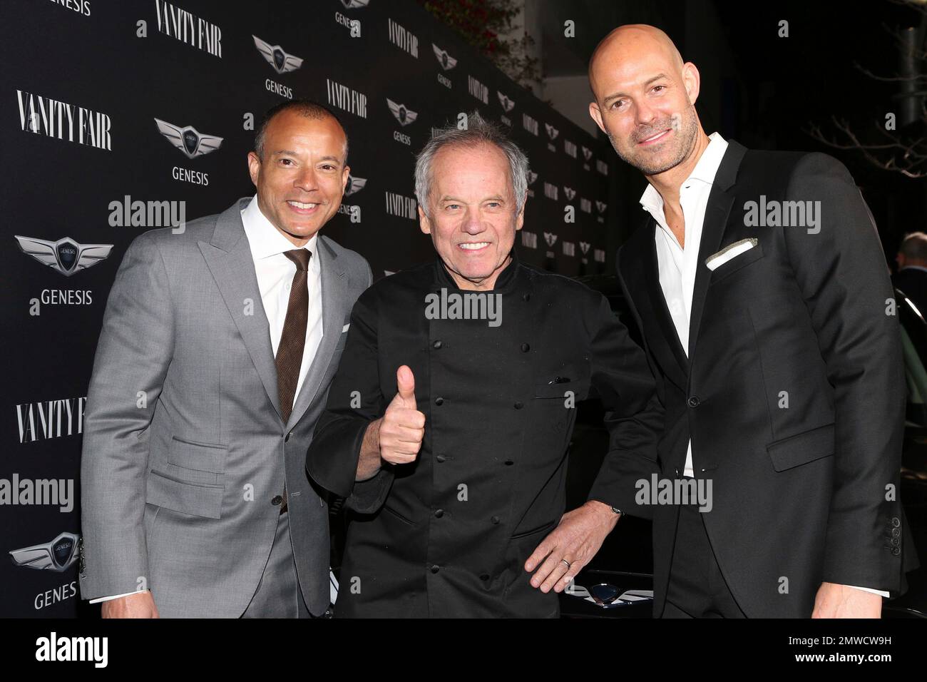 Manfred Fitzgerald, from left, Wolfgang Puck and Chris Mitchell arrive ...