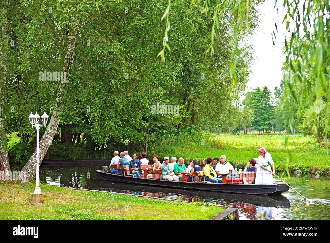 Tourists in a typical barge in the Spreewald, Brandenburg, Germany ...