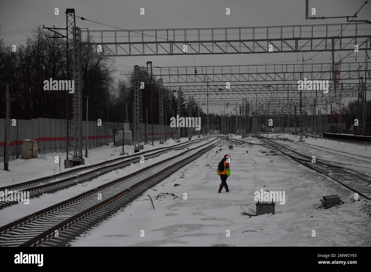Moscow region. Odintsovo. The worker at railway tracks of MCD-4 station ...
