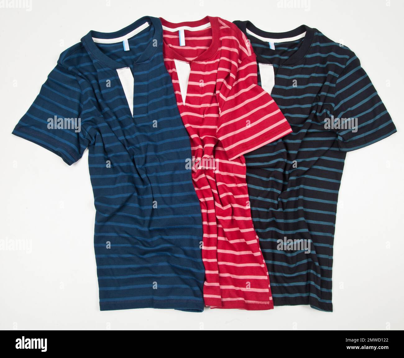 Set Of Three Striped Shirts For Men On White Background Stock Photo - Alamy