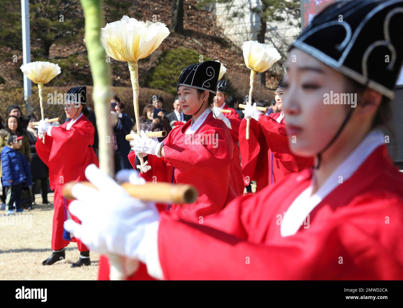 South Korean students wearing traditional Korean costumes perform ...