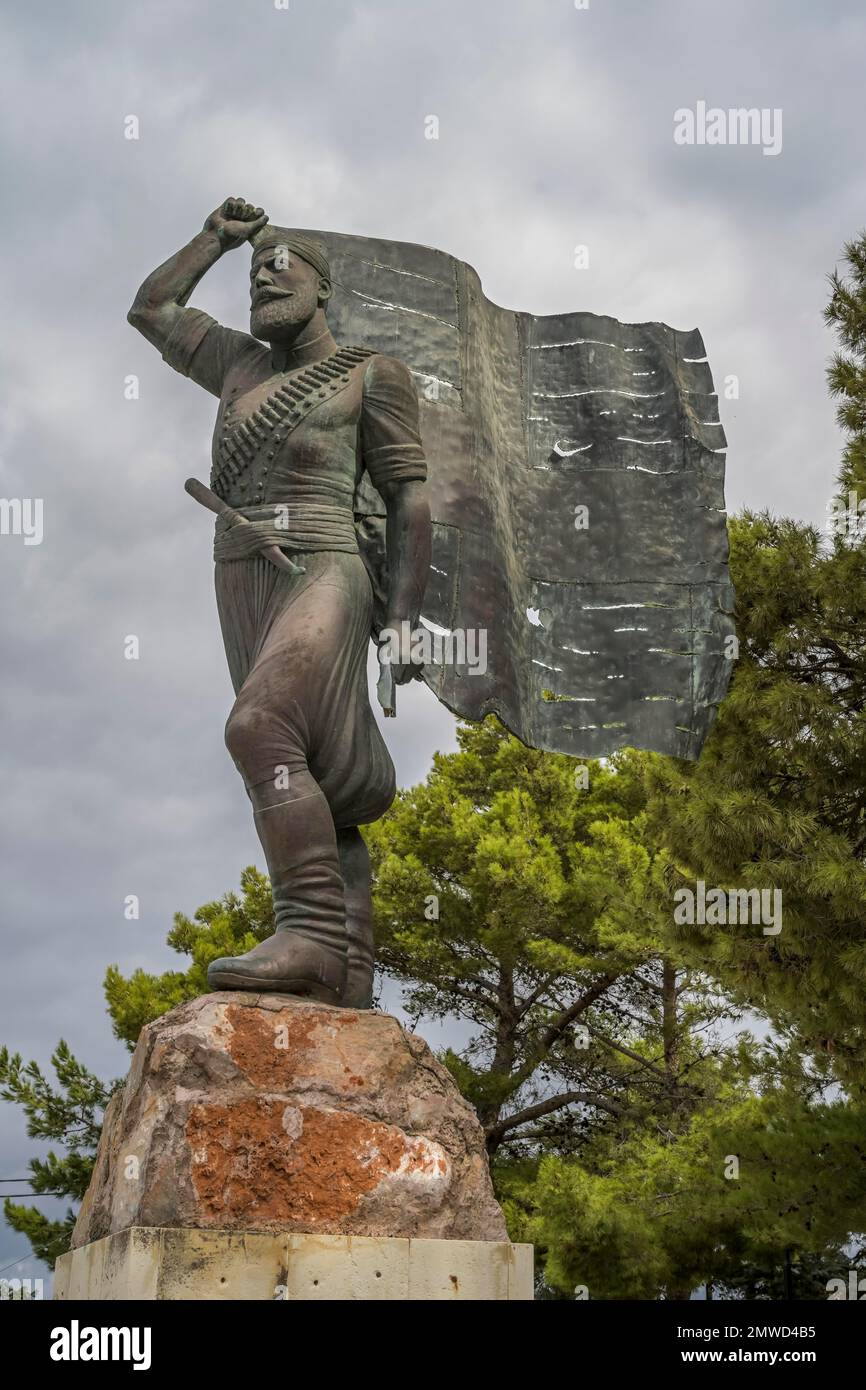 Statue and monument of Spyros Kayales with Greek flag, revolt against ...