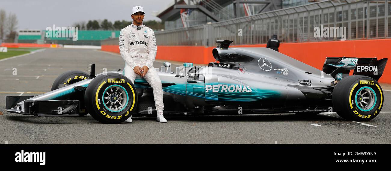 Mercedes driver Lewis Hamilton of Britain poses for photographers at ...