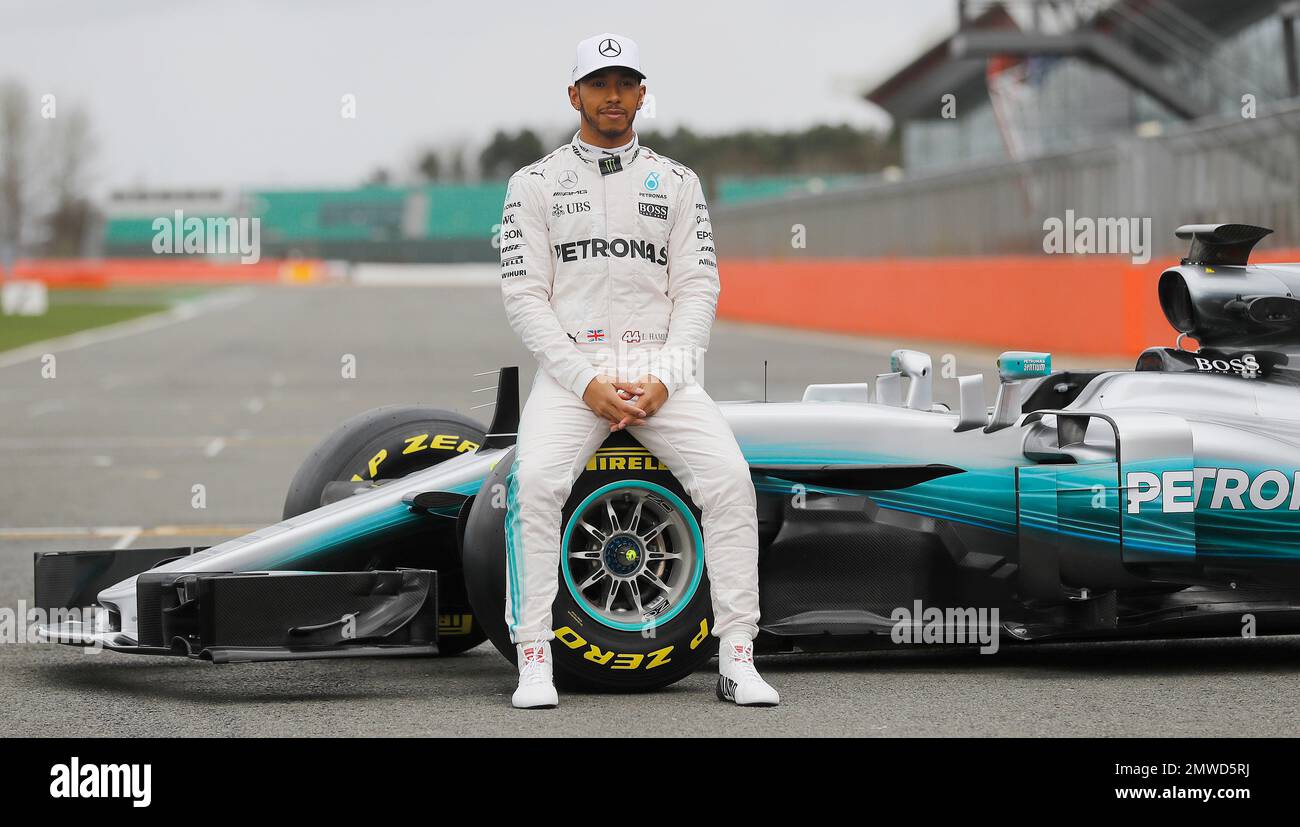 Mercedes driver Lewis Hamilton of Britain poses for photographers at ...