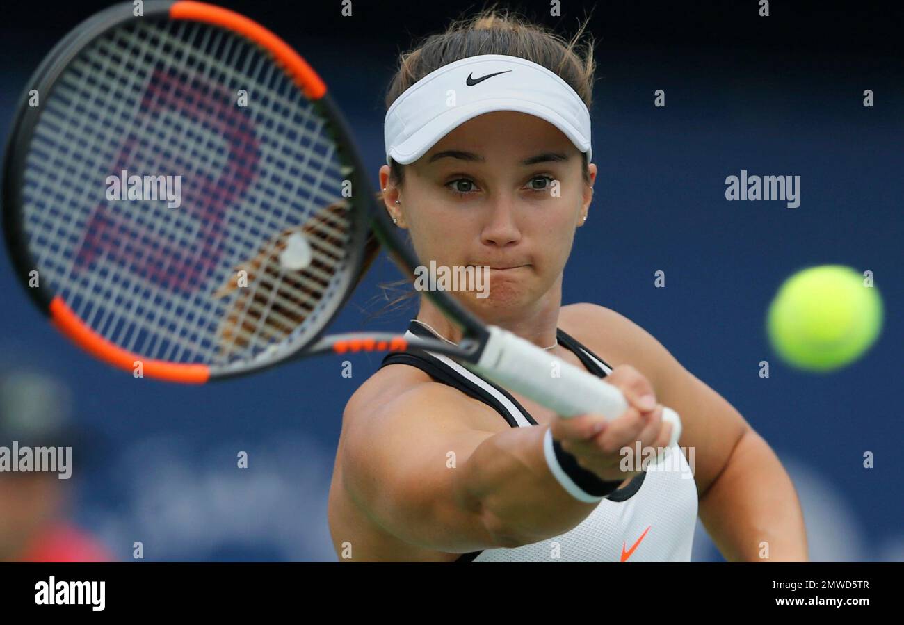 Lauren Davis of the U.S. returns the ball to Elina Svitolina of Ukraine ...