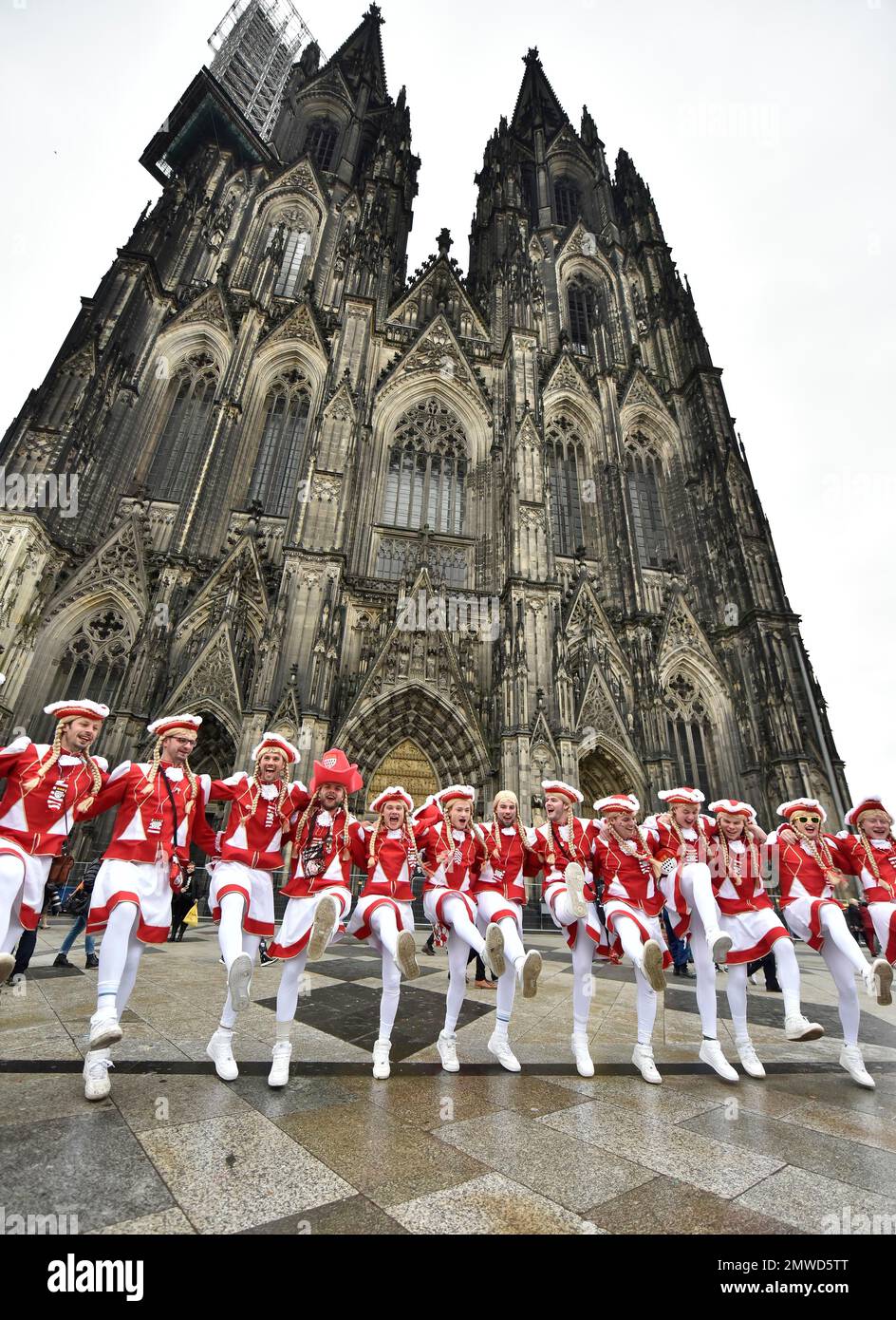 Male dancers perform in front of the world famous Cologne cathedral ...