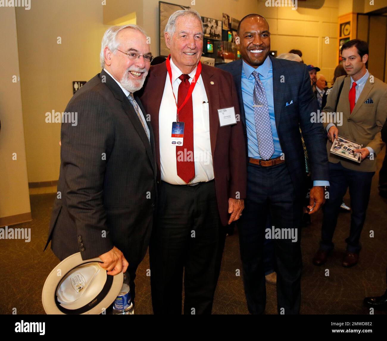 Broadcaster Brad Sham, from left, former football coach Gene Stallings ...