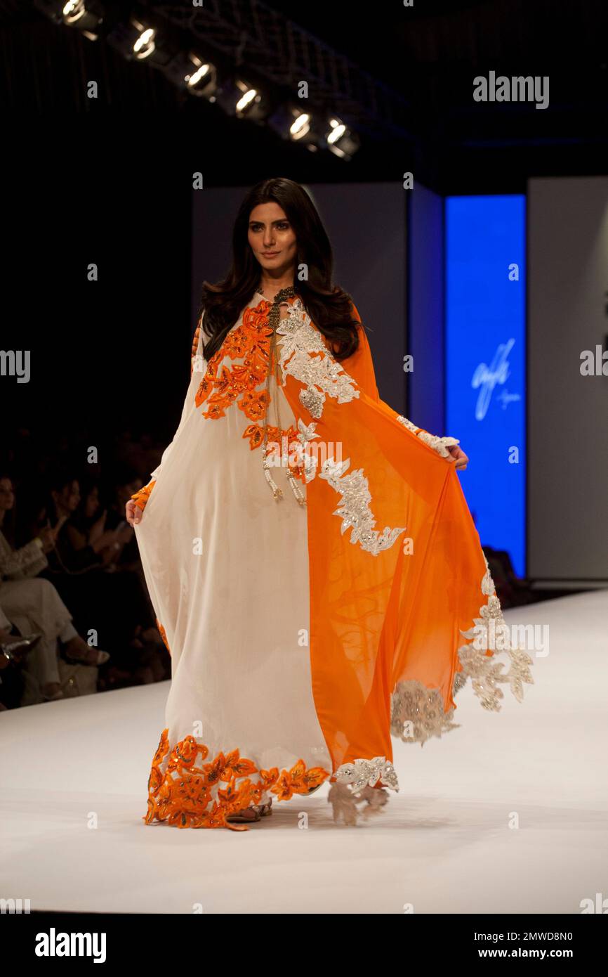 A model presents a creation by designer Ayesha Farook on the first day ...