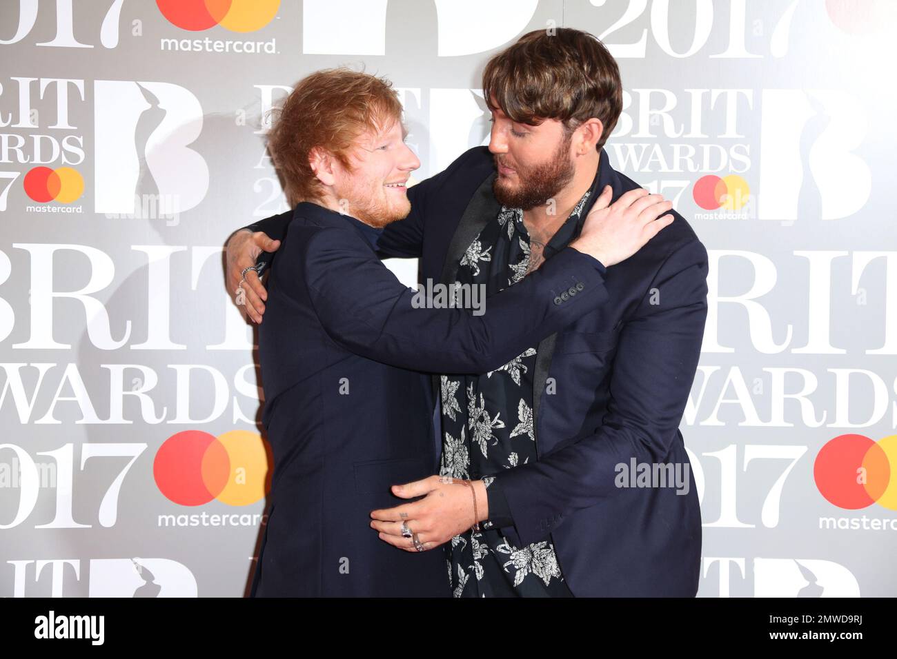 Ed Sheeran and James Arthur pose for photographers upon arrival at the ...