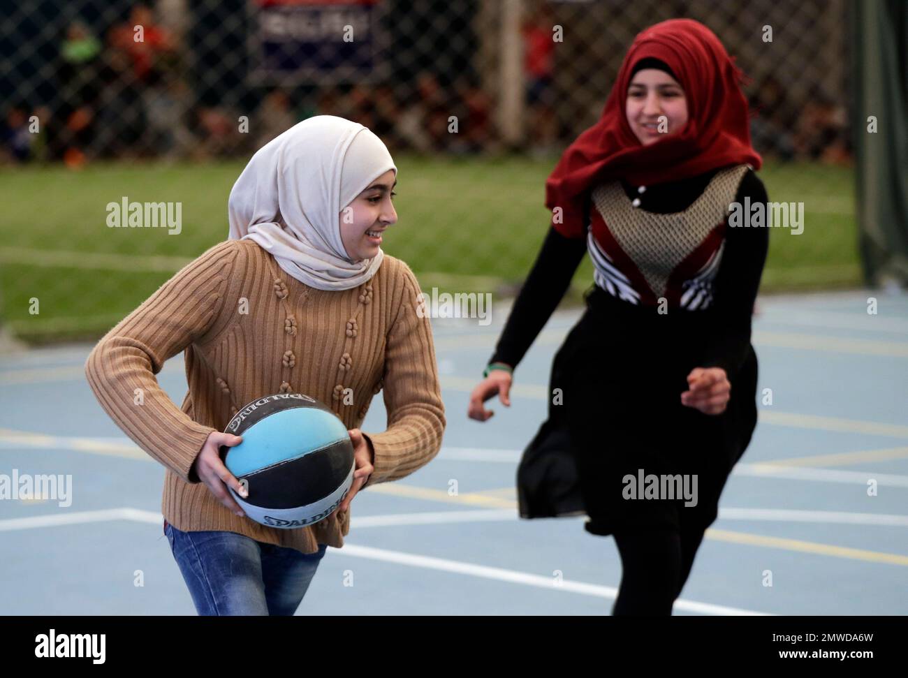 In this picture taken on Sunday, Feb. 19, 2017, Syrian refugee girls ...