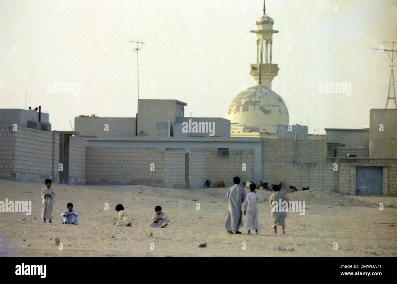 Children at play near a Kuwait mosque, in 1973. (AP Photo Stock Photo ...