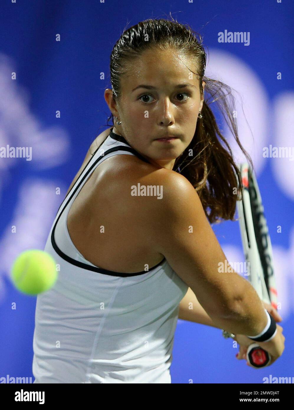 Daria Kasatkina of Russia returns the ball to Caroline Wozniacki of ...