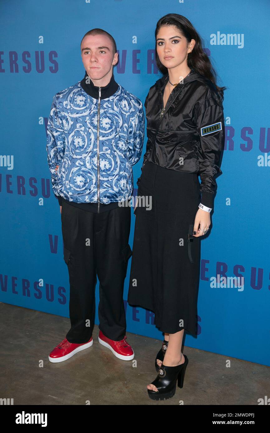 Rocco Ritchie, left and model Kim Turnbull arrive for the Versus ...